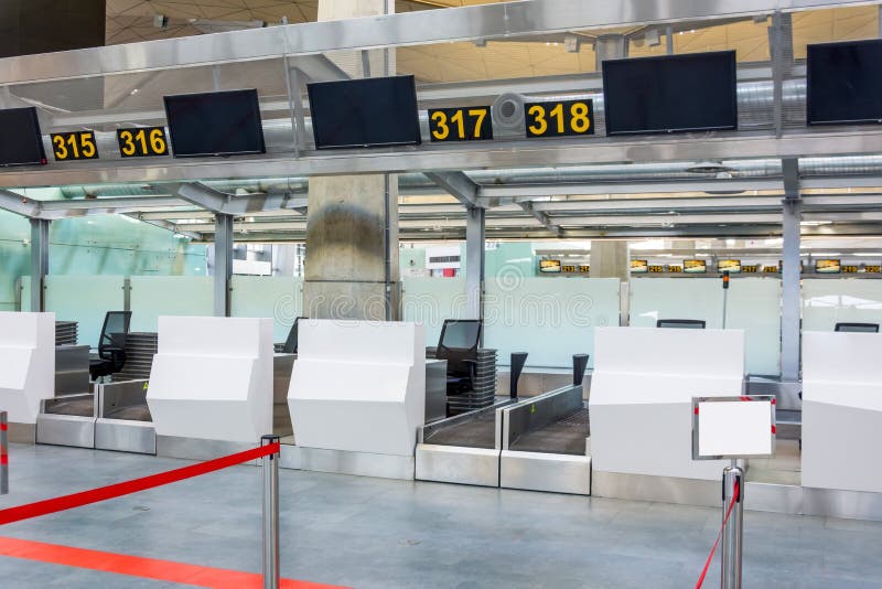 Empty Check-in Desks for Drop Off Baggage with Paths Canceled with a ...