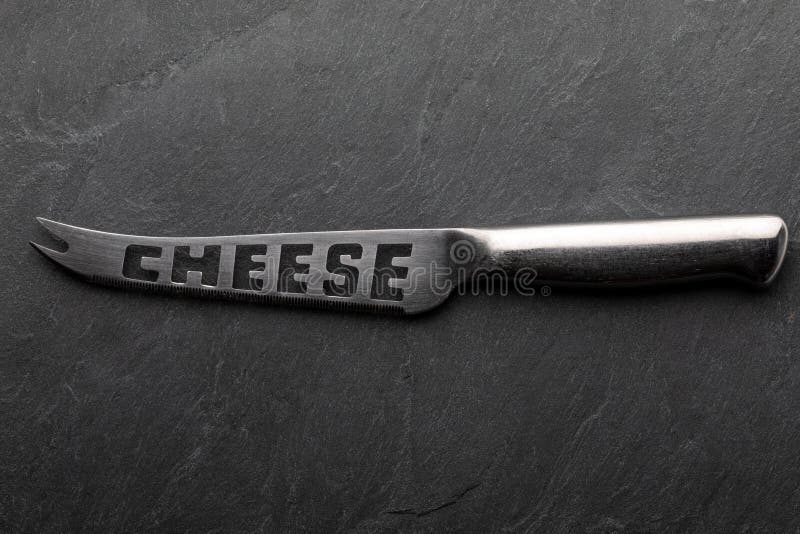 Empty Cheese Board with Knife. Copy Space. on Blackboard. Top View ...