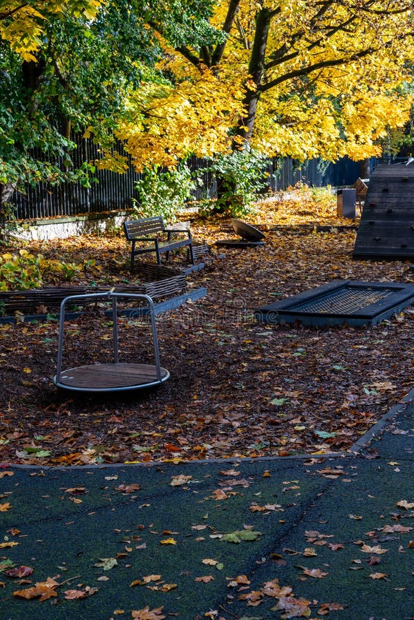 Empty Children S Playground Covered with Fallen Yellow Leaves in Autumn ...