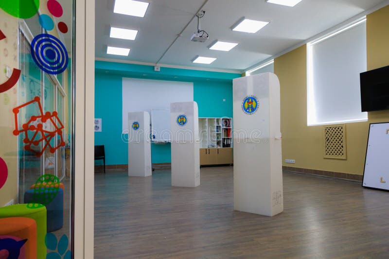 Empty Classroom with Interactive Learning Stations and Colorful Wall ...