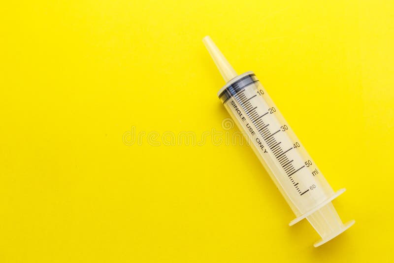 Empty Clear Syringe Yellow Background Stock Photos - Free & Royalty ...
