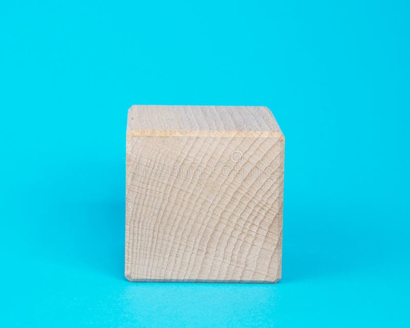 Empty Clear Wooden Cube on Blue Background Stock Image - Image of text ...