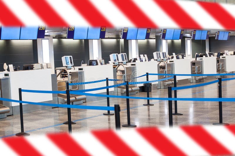Empty Closed Airport Terminal Check-in Hall with Warning Tape. Covid-19 ...