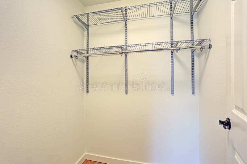 Empty Closet Interior with Wall Mounted Shelves Stock Photo - Image of ...