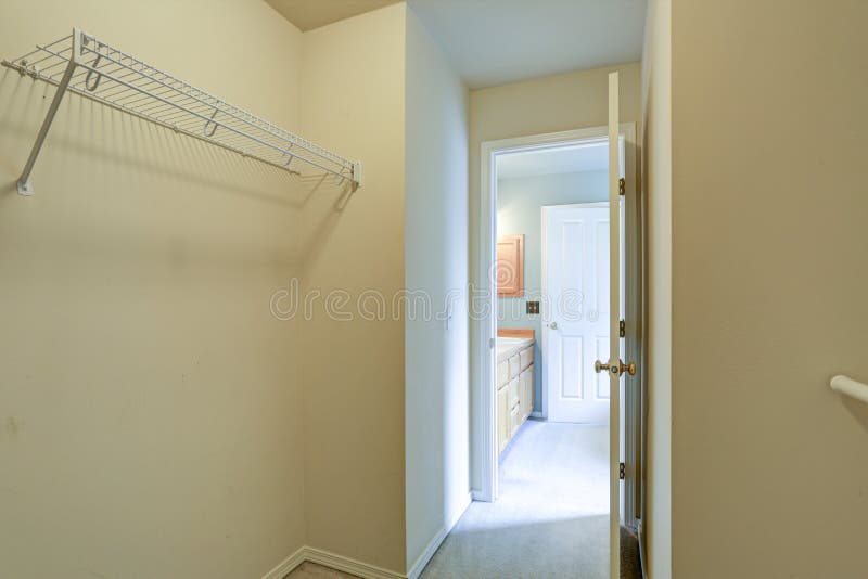 Empty Closet Interior with Wall Mounted Shelves Stock Photo - Image of ...