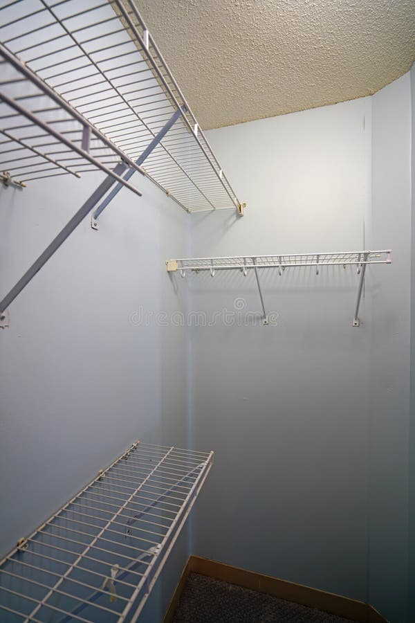 Empty Clothes Closet with Shelves Stock Photo - Image of shelf, shelves ...