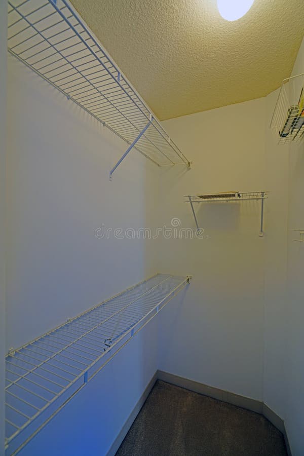 Empty Clothes Closet with Shelves Stock Photo - Image of space ...