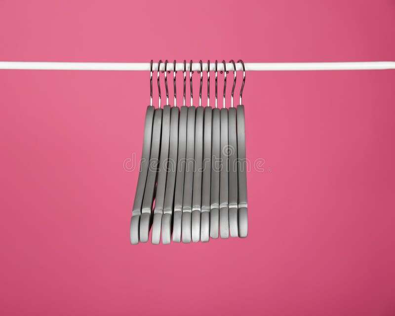 Empty Clothes Hangers on Metal Rail Stock Image - Image of fashion ...