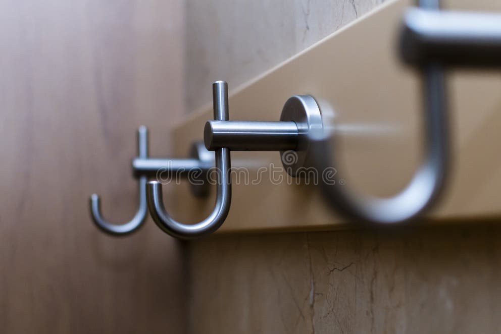 Empty Coat Hooks of a Wardrobe Stock Photo - Image of wardrobe, wall ...