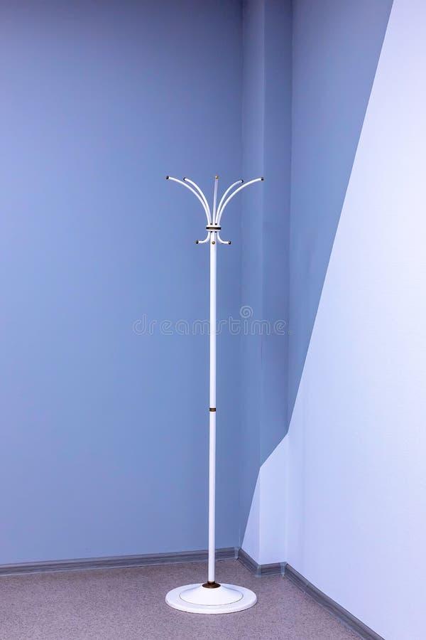 An Empty Coat Rack Stands on the Floor in Office. Vertical View Stock ...
