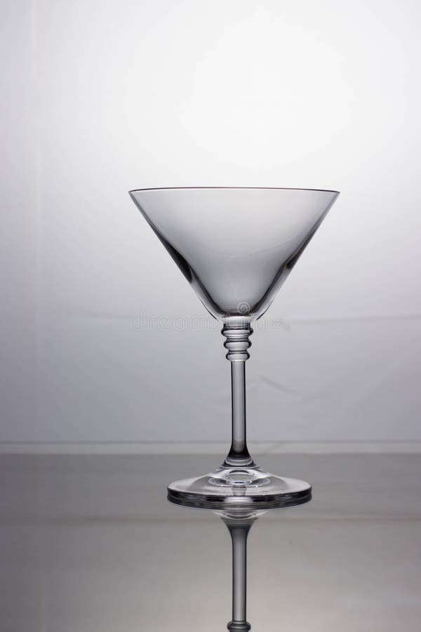 Empty Transparent Cocktail Glass on a Light Background Stock Photo ...
