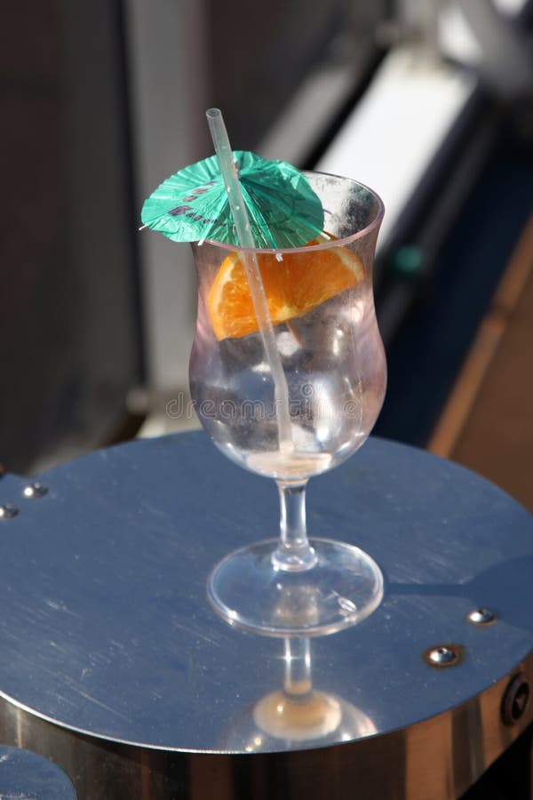 Empty Cocktail Glass with Blue Thin and High Leg on Dark Wooden Surface ...