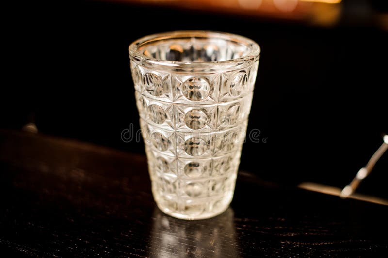 Empty Cocktail Glass on a Wooden Table in a Bar Stock Image - Image of ...