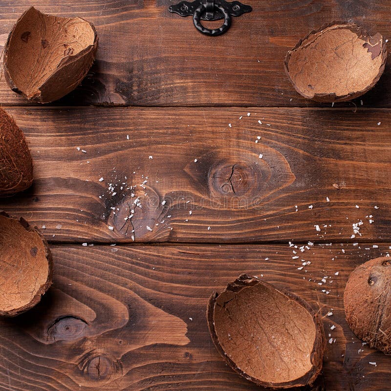 Empty Coconut Shells on a Wooden Table Stock Photo - Image of close ...
