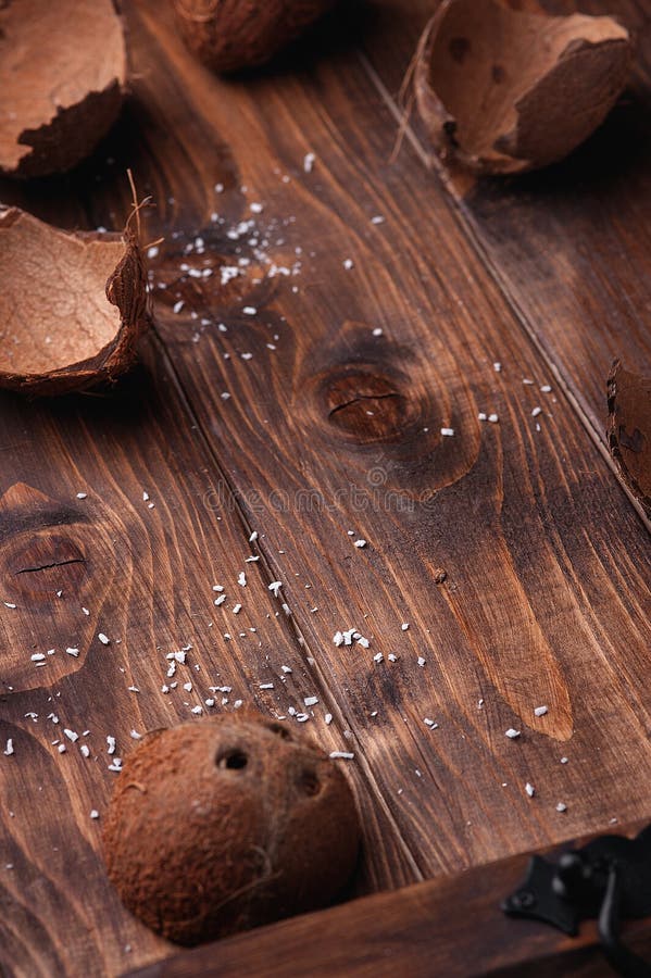 Empty Coconut Shells on a Wooden Table Stock Photo - Image of closeup ...