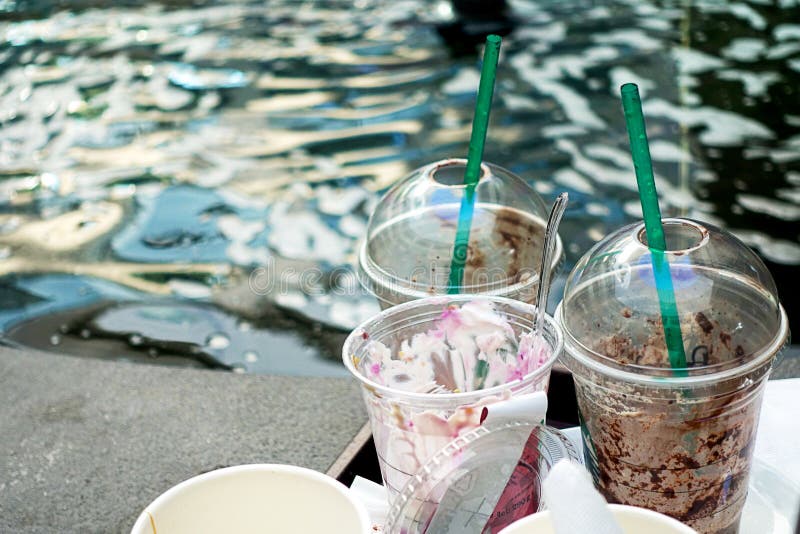 Empty Beverage Cups Left on the Table by the Sea Stock Image - Image of ...