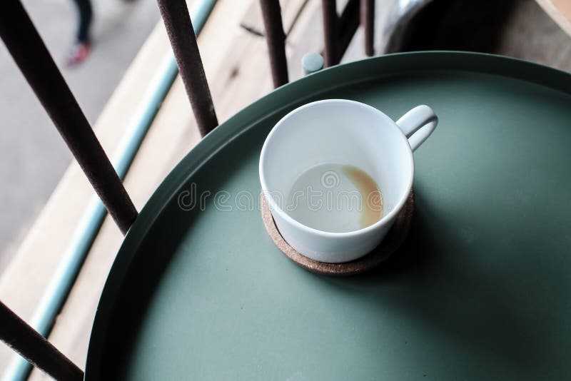 Empty Coffee Cup of Coffee after Drink on Green Table Background in the ...