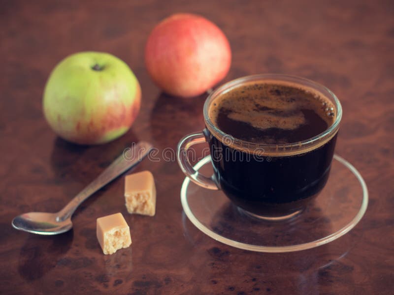 Empty Coffee Cup with Spoon and Two Apples on the Table. Stock Image ...