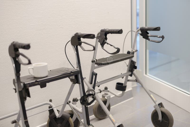 An Empty Coffee Cup Stands on a Walker for the Elderly and Disabled in ...
