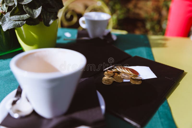 Empty Coffee Cup on a Table. Check Please. Coffee and Check Stock Image ...