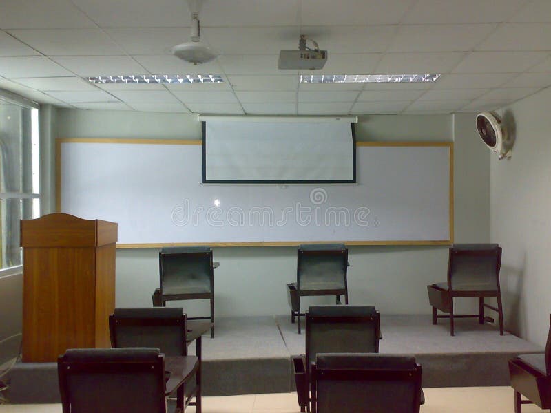 An Empty College Classroom with a Blank Smart Board Stock Image - Image ...