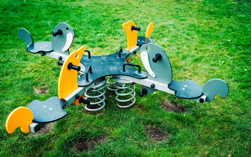 Empty Colorful Rocking Animals at Playground Stock Photo - Image of ...