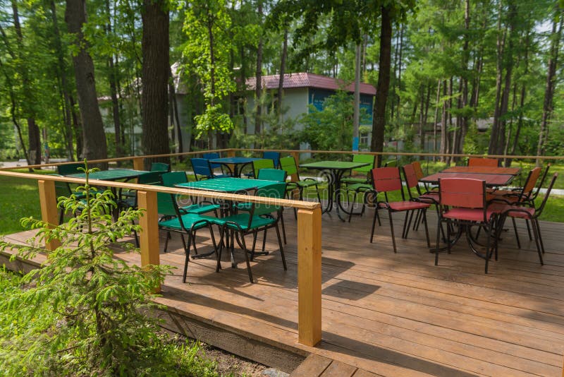 Empty Colorful Tables at an Outdoor Cafe Stock Image - Image of green ...
