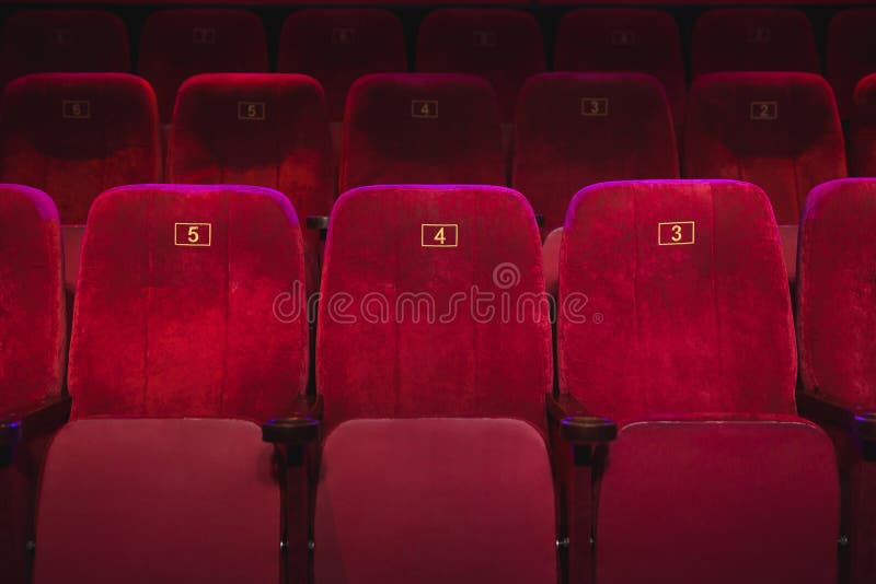 Empty Comfortable Red Seats with Numbers in the Cinema. Stock Photo ...