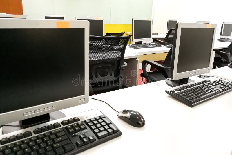 Empty Computer Classroom with Monitors on Top of Table Stock Photo ...