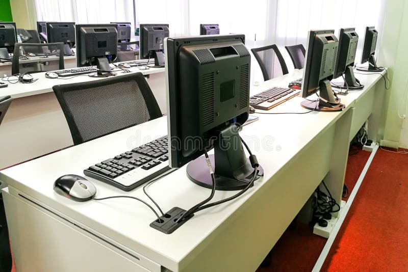 Empty Computer Classroom with Monitors on Top of Table Stock Image ...