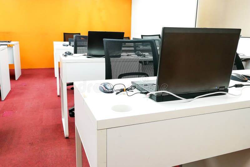 Empty Computer Classroom with Monitors on Top of Table Stock Photo - Image of display ...