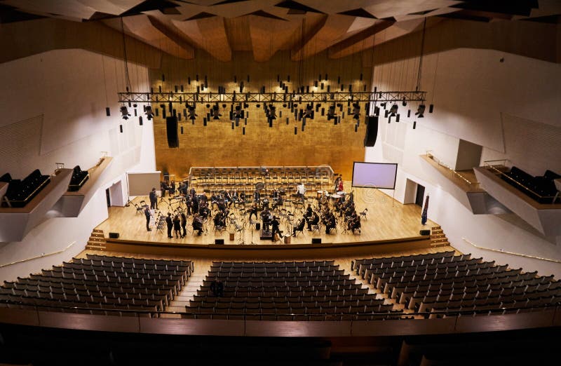Empty Concert Hall with Some Musicians Practicing Stock Photo - Image ...