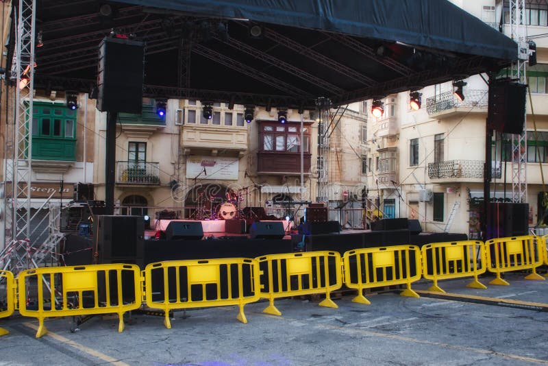 Empty Concert Stage with Yellow Plastic Barriers in Front Editorial ...