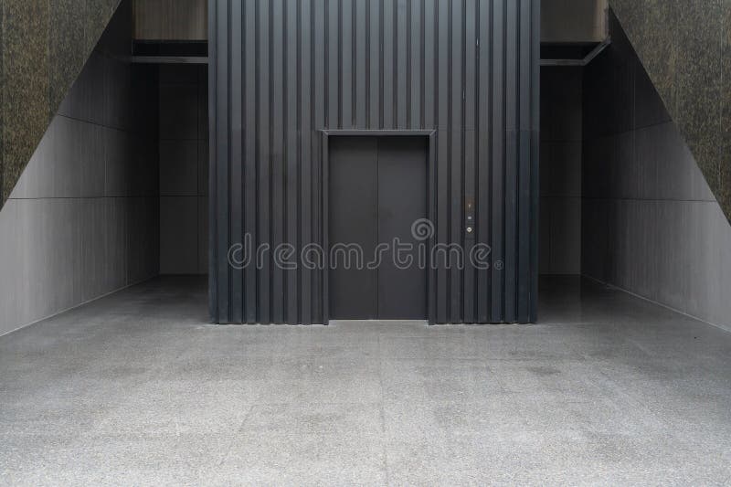 Empty Concrete Floor in Front of Modern Building Entrance with Elevator ...