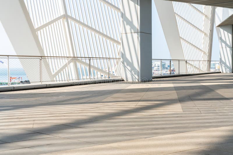 Empty Concrete Floor in Front of Modern Downtown Buildings, Ideal for ...