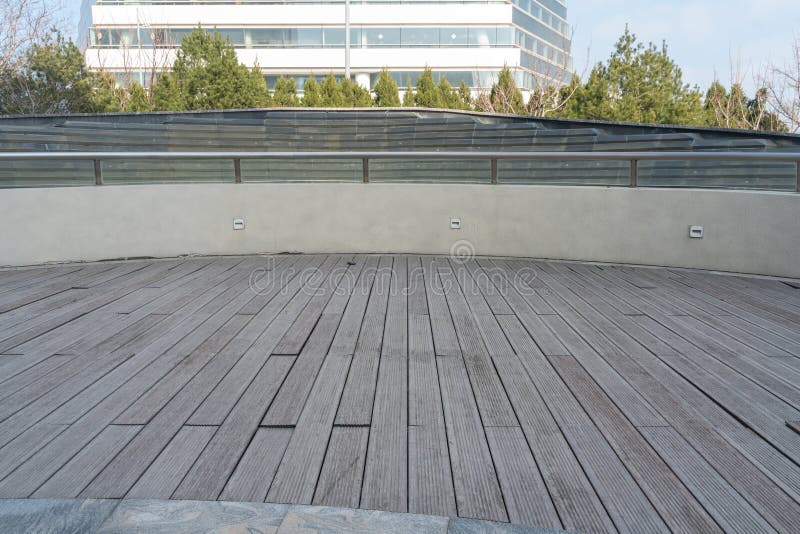 Empty Concrete Floor in Front of Modern Downtown Buildings, Ideal for ...