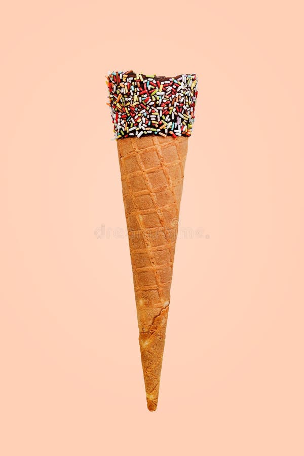 Empty Cone with Colored Sugar and Chocolate on a Beige Background with ...