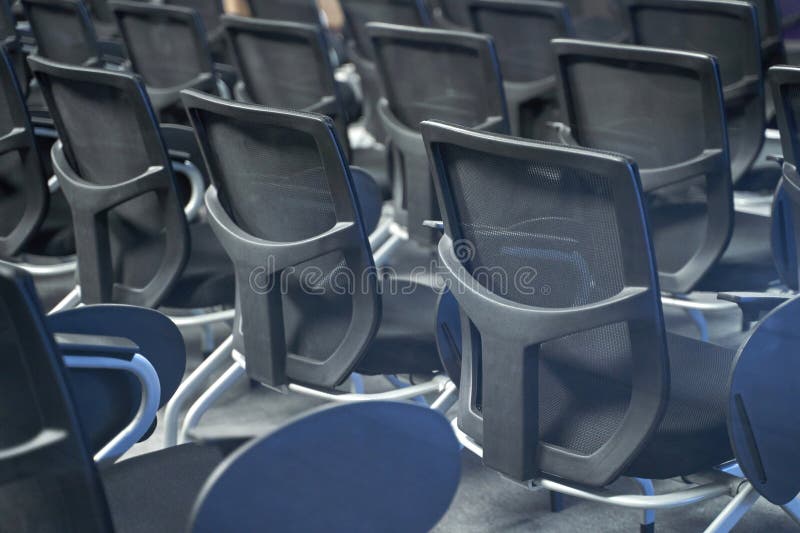 Empty Conference Room with Rows of Modern Black Office Chairs Arranged ...
