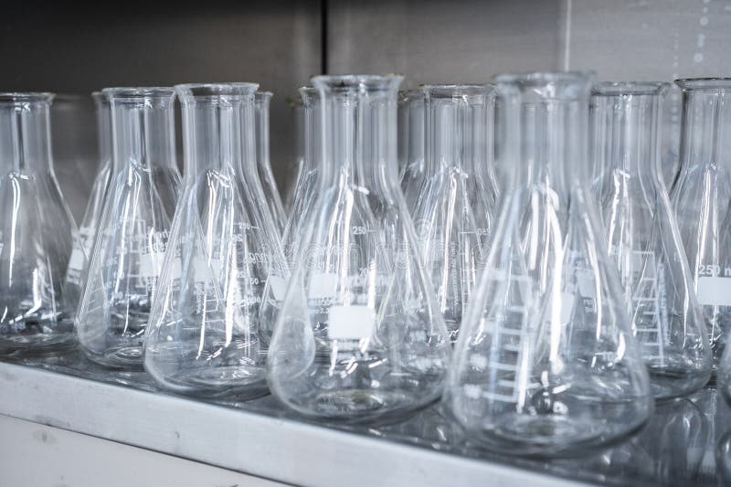 Empty Conical Erlenmeyer Flasks on the Shelf Ready for Chemical ...