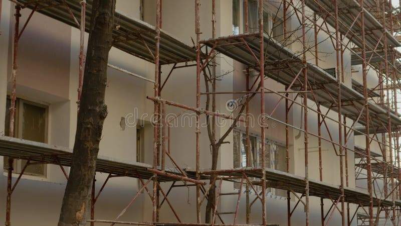 Construction Site with Scaffolding for Apartment Building Renovation ...