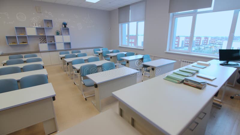 Classroom with Desks Chairs and Glass Wall in School Stock Video ...