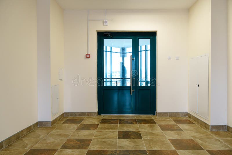 An Empty Corridor in an Office Building. Closed Doors To the Office and ...