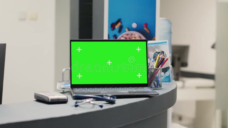 Greenscreen Display on Laptop at Hospital Reception Desk Stock Footage ...