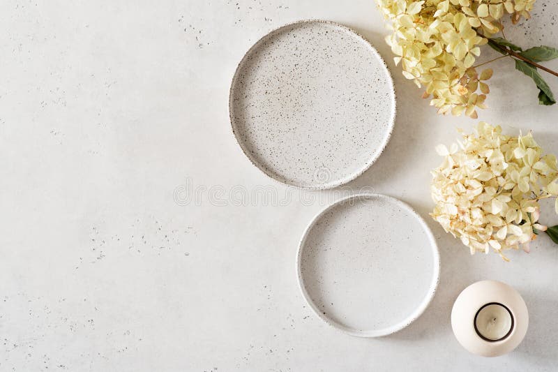 Empty Craft Handmade Ceramic Grey Plates and Flowers Stock Image ...
