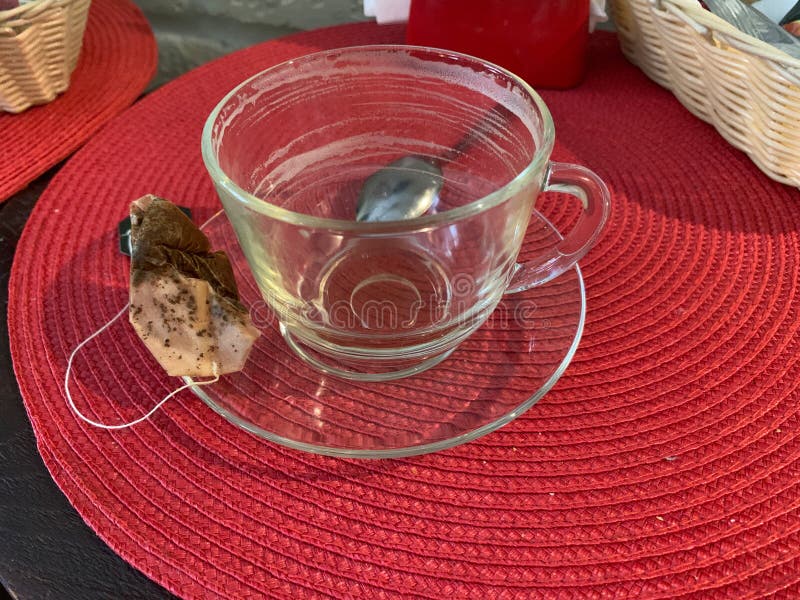 Empty Cup of Tea with a Saucer on Table with a Tea Bag. Drunk Empty Mug ...