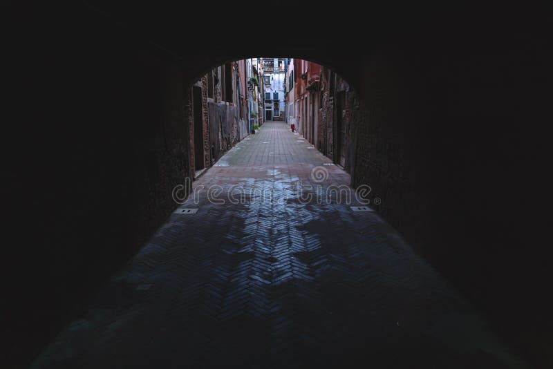 Dark Alley Behind Arch in Venice, Italy Stock Image - Image of ...