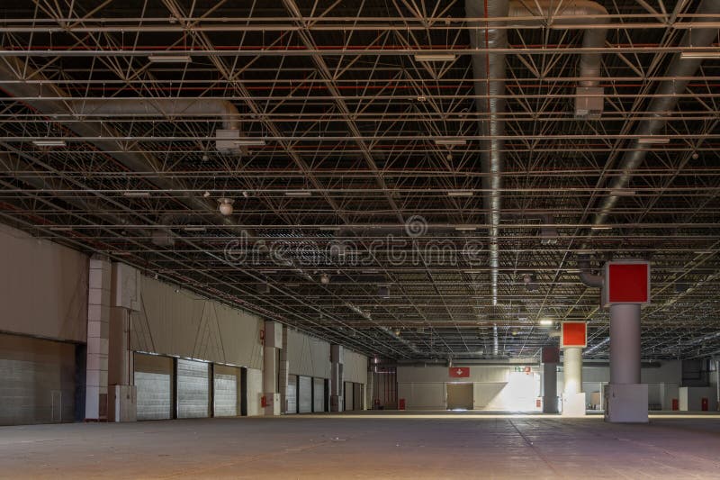 Empty and Dark Large Warehouse. Factory Warehouse, Interior View ...