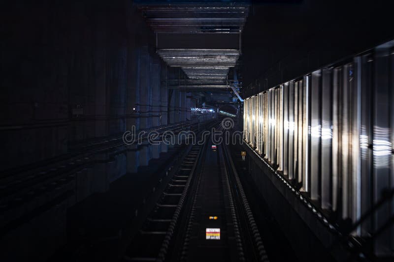Empty Dark Subway Tunnel with a Train Track Stock Photo - Image of ...
