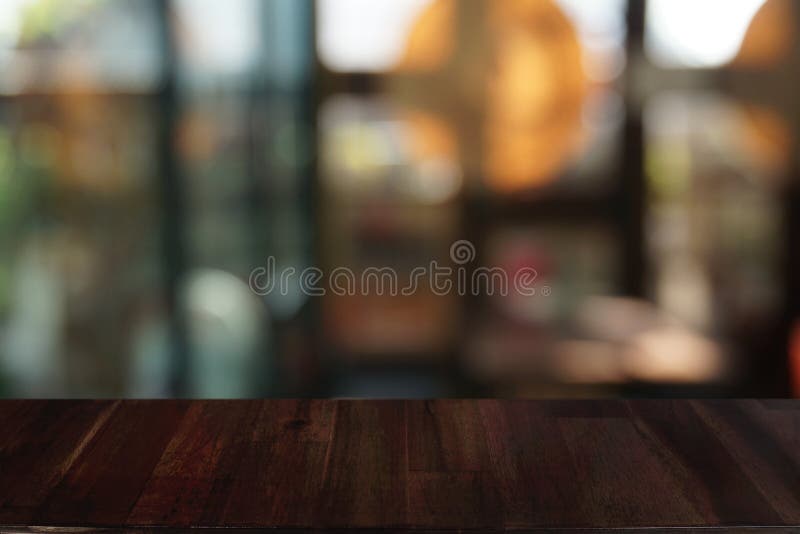 Empty Dark Wooden Table in Front of Abstract Blurred Bokeh Background ...