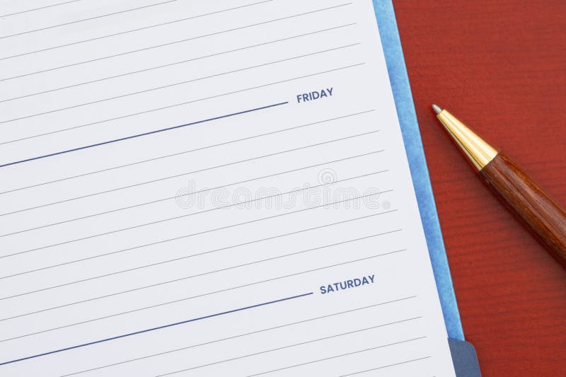 Empty Day Planner with Friday and Pen on Desk Stock Photo - Image of ...
